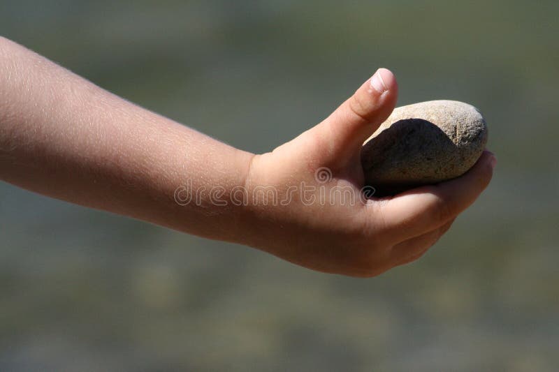 Cobblestone Held in Child Right Hand Stock Image - Image of thumb ...
