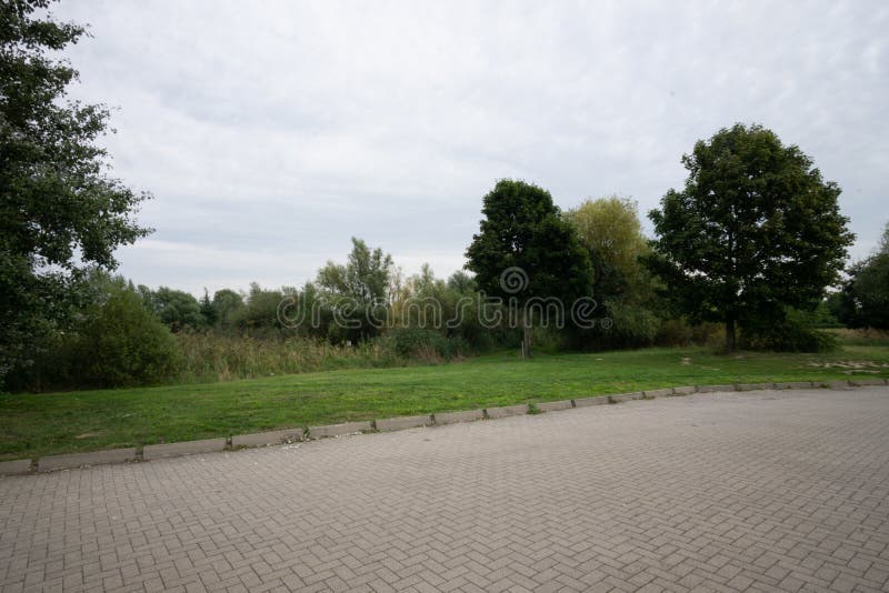 Cobblestone Path Near a Green Park Stock Photo - Image of grass, nature ...