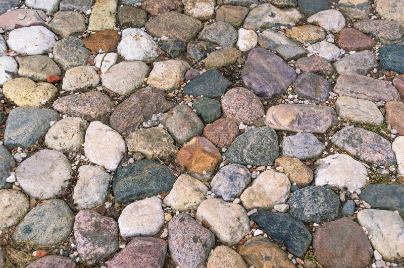 Background of Cobblestones of Different Colors on the Road. Stock Image ...