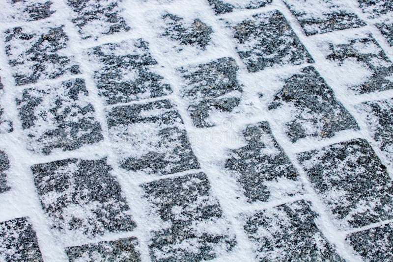 Cobblestone Pavement Covered with Snow and Ice Stock Photo - Image of ...