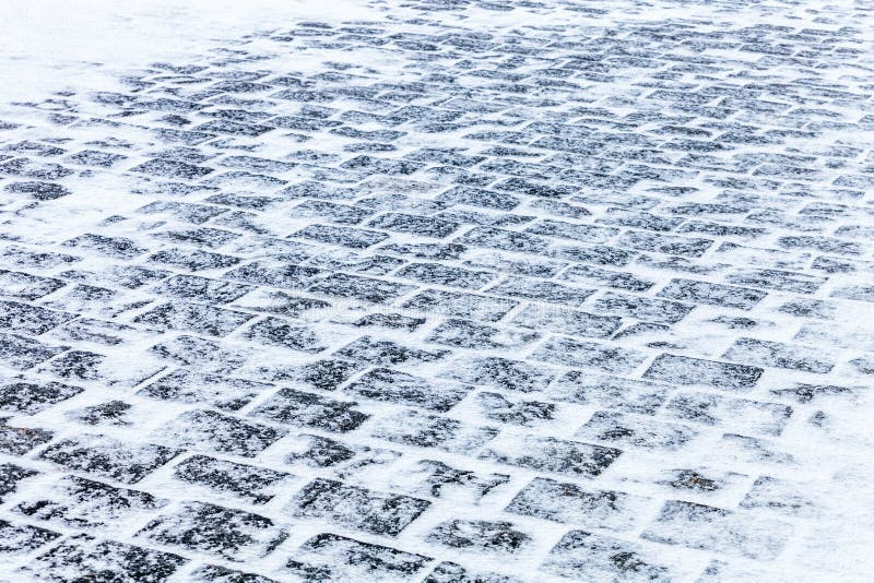 Cobblestone Pavement Covered with Snow and Ice Stock Photo - Image of ...
