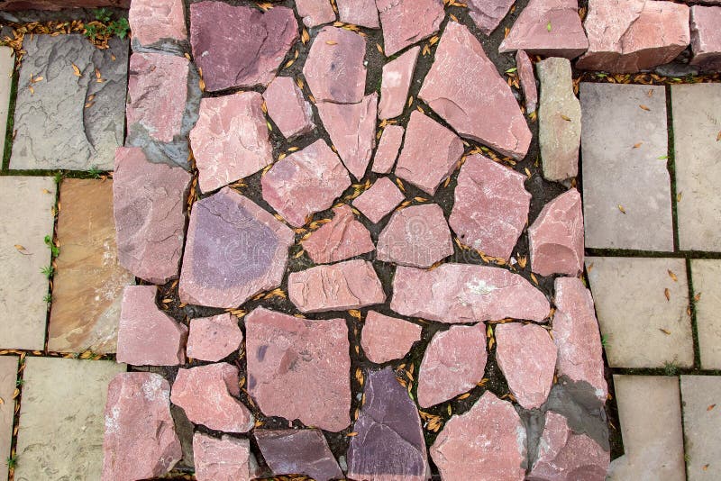 Cobblestone Pavement Made of Red Rough Stone. Stock Image - Image of ...