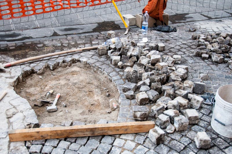 Cobblestone Pavement Repairing Stock Photo - Image of pavers, granite ...