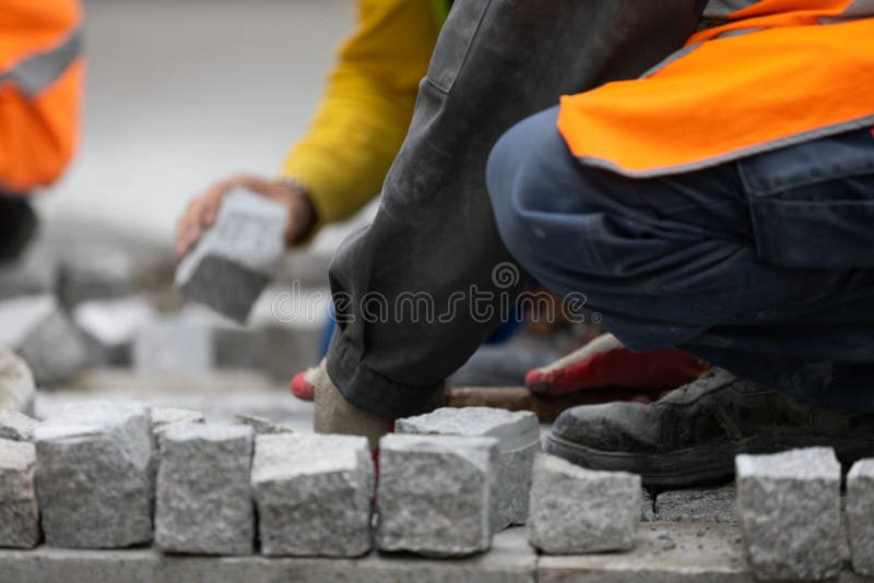 Cobblestone Sidewalk Construction Stock Photo - Image of paved ...
