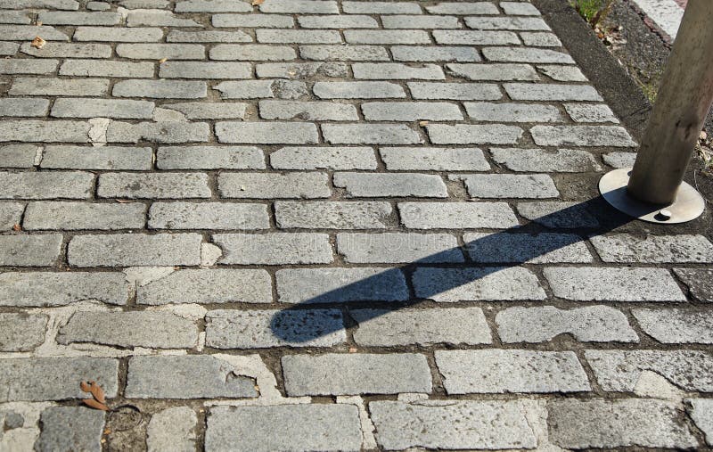 Cobblestone sidewalk stock image. Image of tile, flooring - 313350717