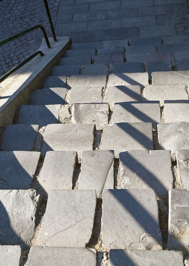 Cobblestone Steps in a Historic Area with Shadows Stretching Across the ...