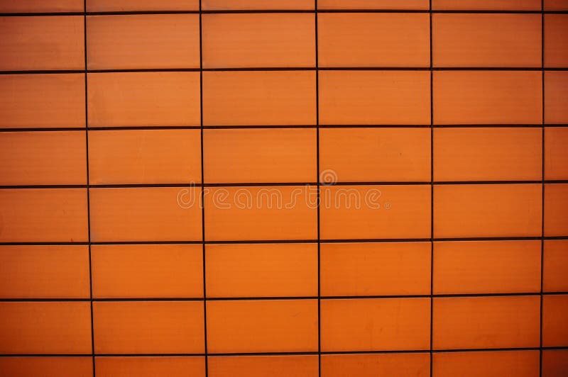 Cobblestone Wall with Rectangular Orange Tiles Stock Photo - Image of ...