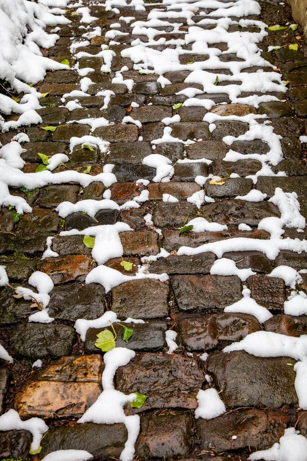 The Cobblestones are Covered with Snow Stock Photo - Image of ...