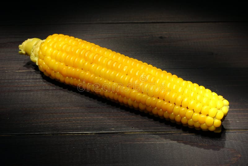 Cobs of Yellow Boiled Corn on a Dark Background Stock Photo - Image of ...