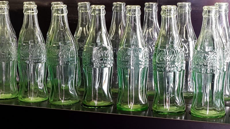 Coca-Cola bottle empty editorial image. Image of alcohol - 234190405