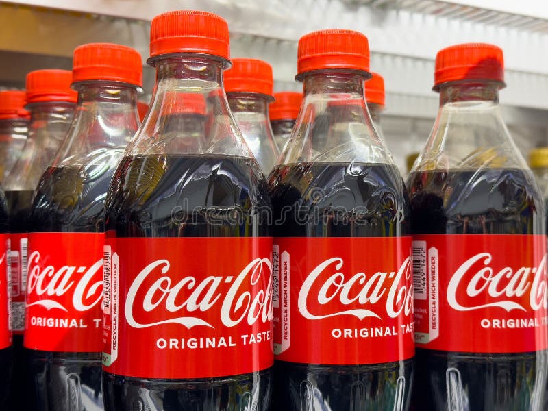 Coca-cola Bottles with Red Caps in Refrigerated Display Editorial Image ...