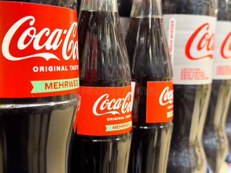 Coca-cola Bottles with Red Labels Displayed in a Row Editorial Stock ...