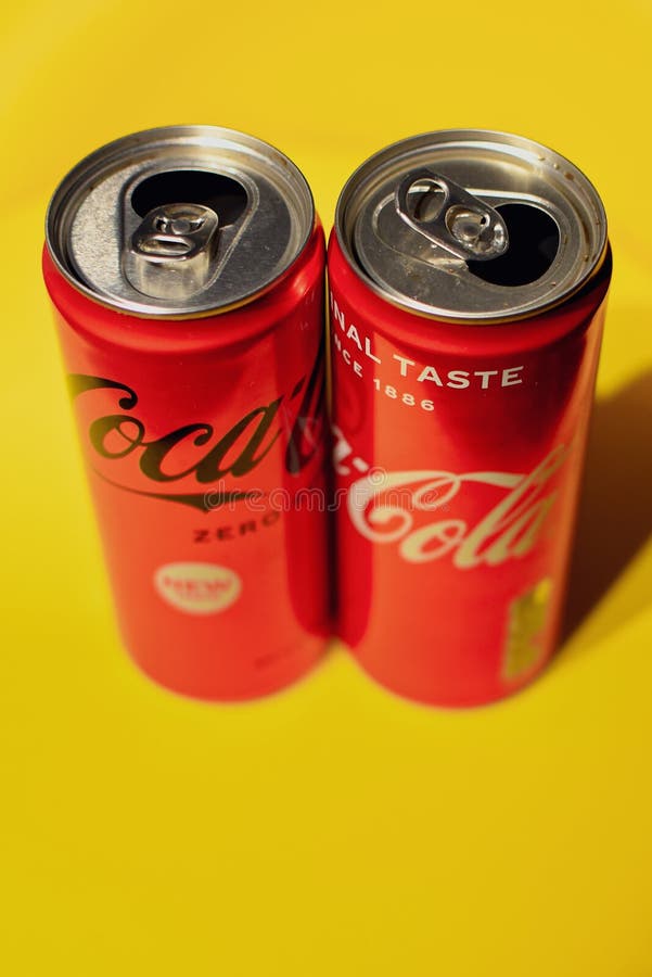 Coca Cola Cans on Yellow Background Editorial Stock Image - Image of ...