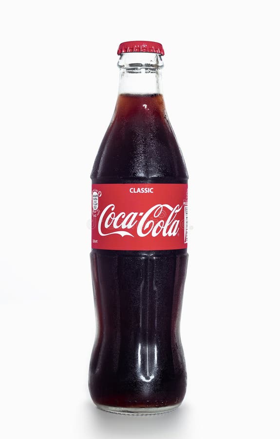Coca-Cola Classic in Wet Glassy Bottle Standing on White Editorial ...