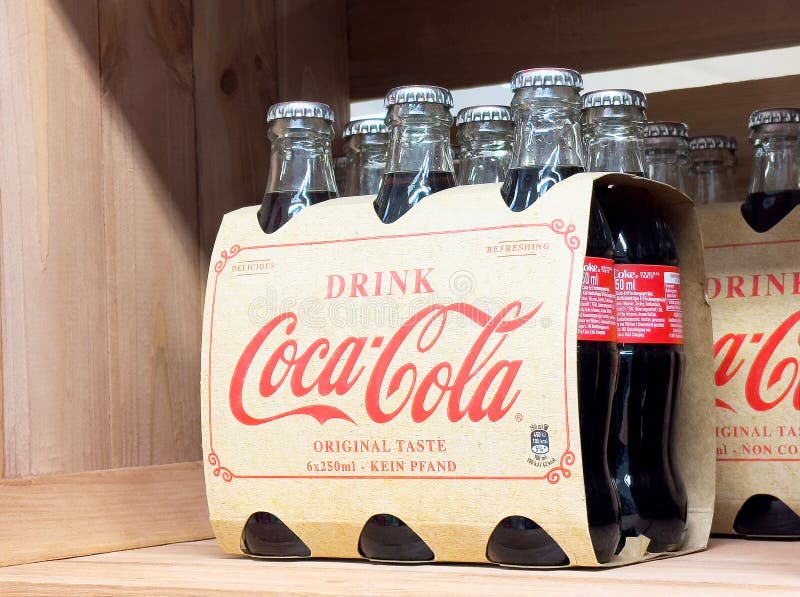 Coca-cola Glass Bottles Pack on Wooden Shelf in Store Display Editorial ...