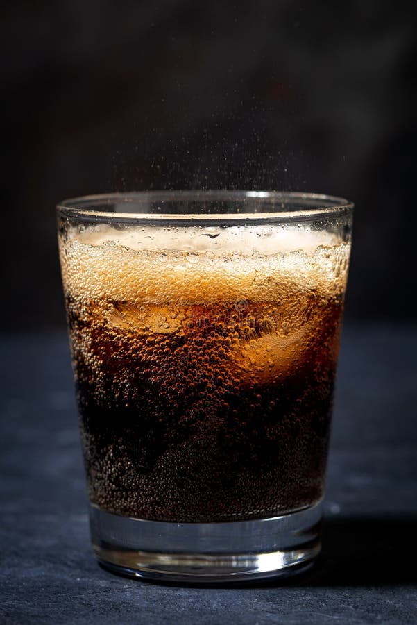 Coca Cola with Ice in a Glass on a Dark Background Stock Photo - Image ...