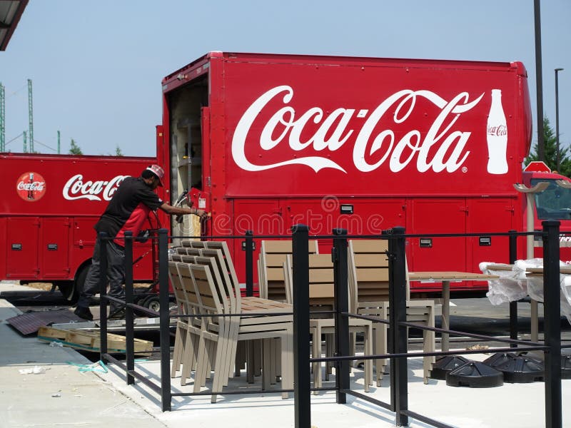 Coca Cola Trucks and Man Unloading Merchandise Editorial Stock Image ...