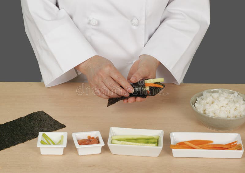 Cocinero De Sushi En El Trabajo Imagen de archivo - Imagen de pescados ...