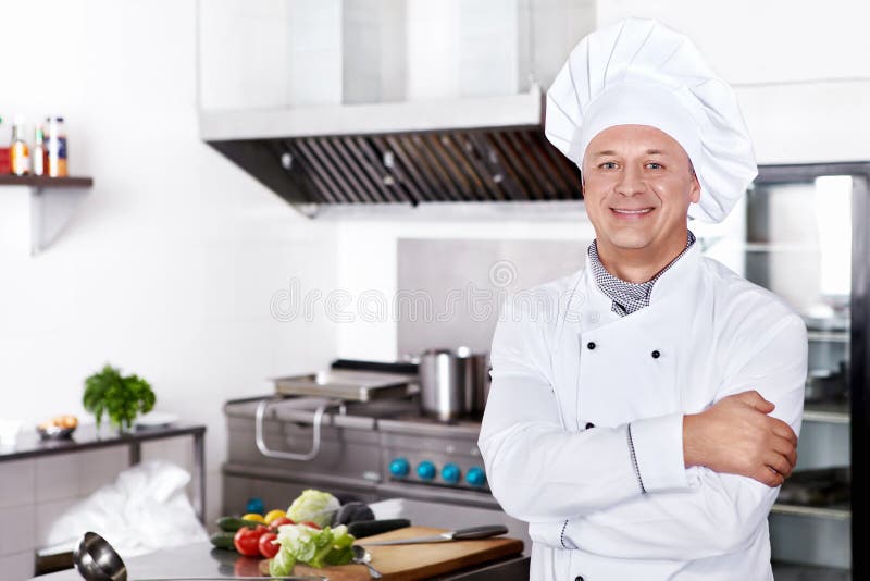Cocinero en la cocina imagen de archivo. Imagen de sonriente - 24255455
