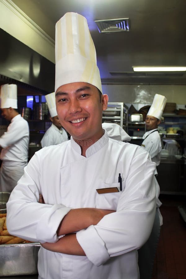 Cocinero Que Trabaja En La Cocina Foto de archivo - Imagen de grupo ...