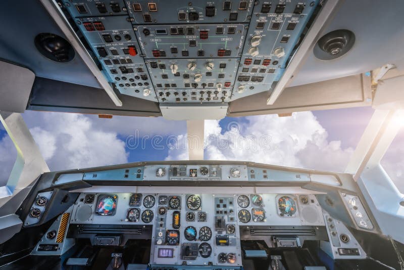 Cockpit with Control Panel Against Cloudy Sky Stock Photo - Image of ...