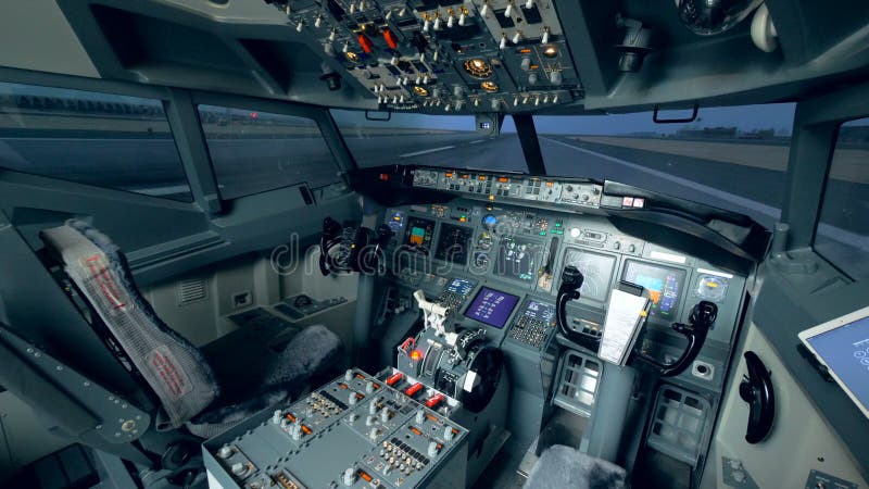 Cockpit Interior of Modern Passenger Aircraft with Seats for Two Pilots ...