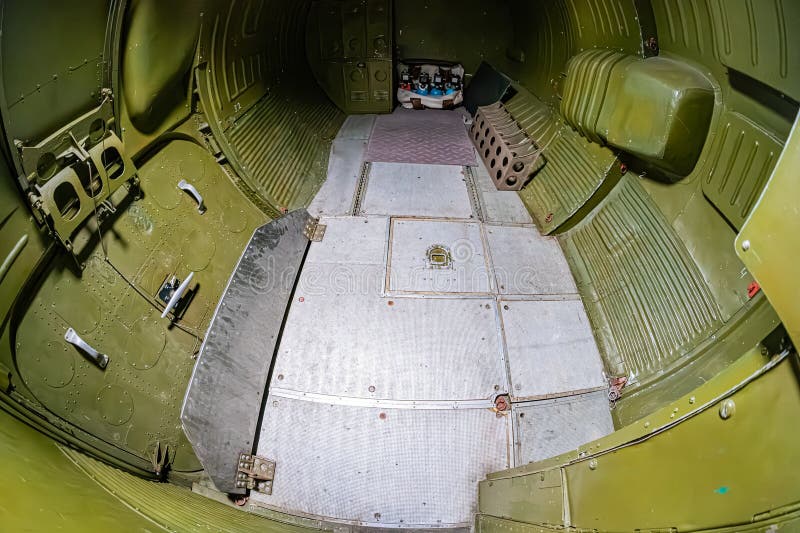 Cockpit Interior View, Primarily Green Control Panels and Dials ...