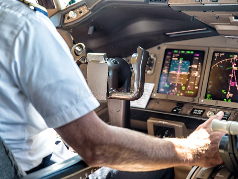 Pilots in Cockpit editorial photo. Image of crew, modern - 44066311