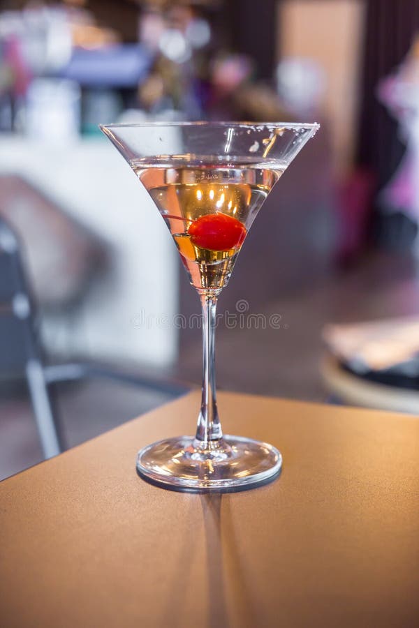 Cocktail Alcohol with Red Cherry on Table in Resturant Stock Photo ...