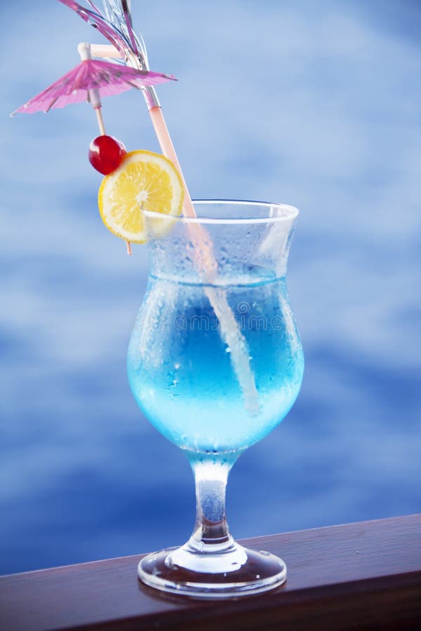 Exotic Blue Bottle Alcohol Cocktail Stock Image - Image of mint, fruit ...