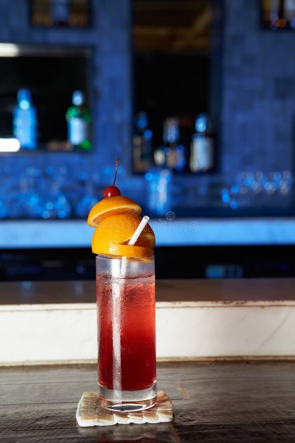 Cocktail on Coaster in Bar stock photo. Image of glass - 32062252