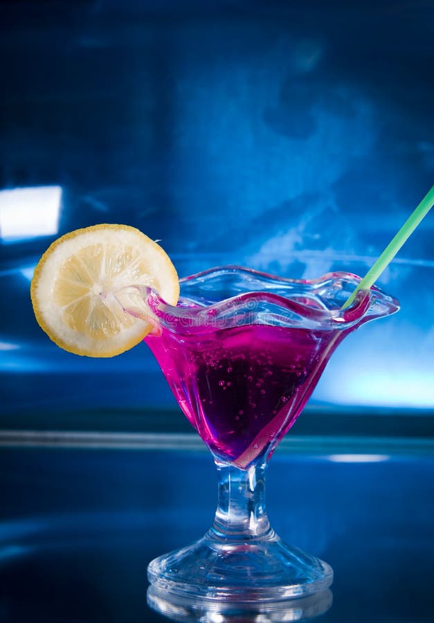 Cocktail drink on blue stock image. Image of citrus, holiday - 13368369