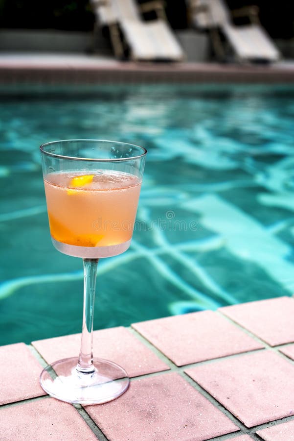 Cocktail drink by the pool stock image. Image of holiday - 116460059