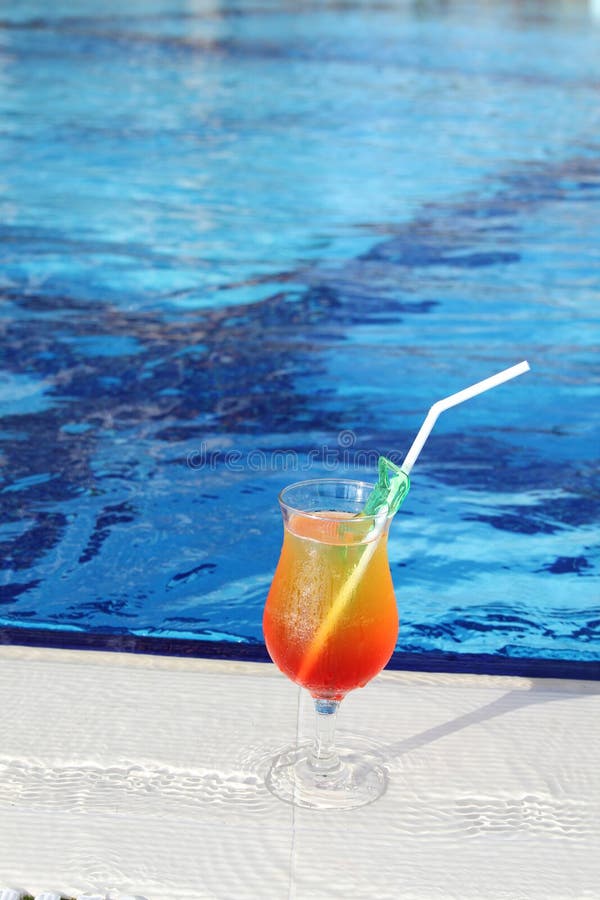 Cocktail Drinks Poolside stock image. Image of colored - 61176659