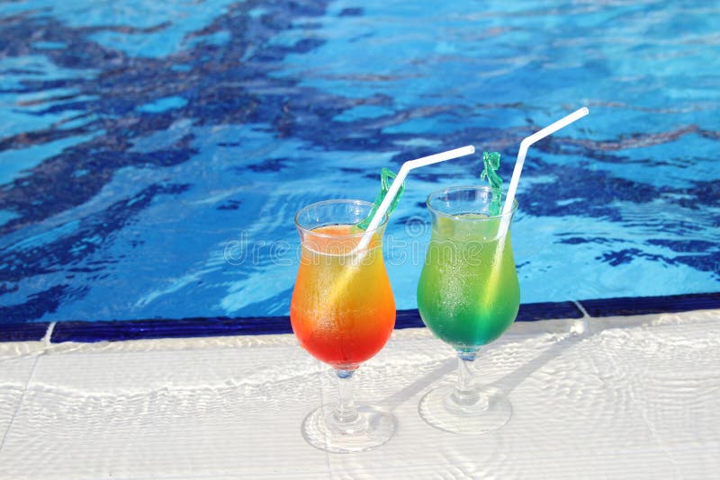 Cocktail Drinks Poolside stock image. Image of blue - 149512809