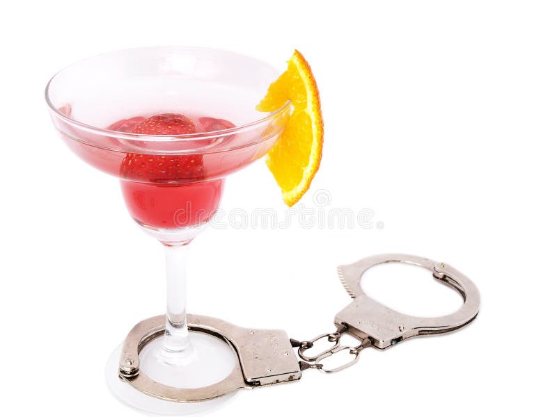 Cocktail and handcuffs stock photo. Image of studio, drink - 13245870