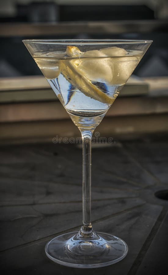 A Cocktail Glass with Ice and Lemon Stock Photo - Image of fresh ...