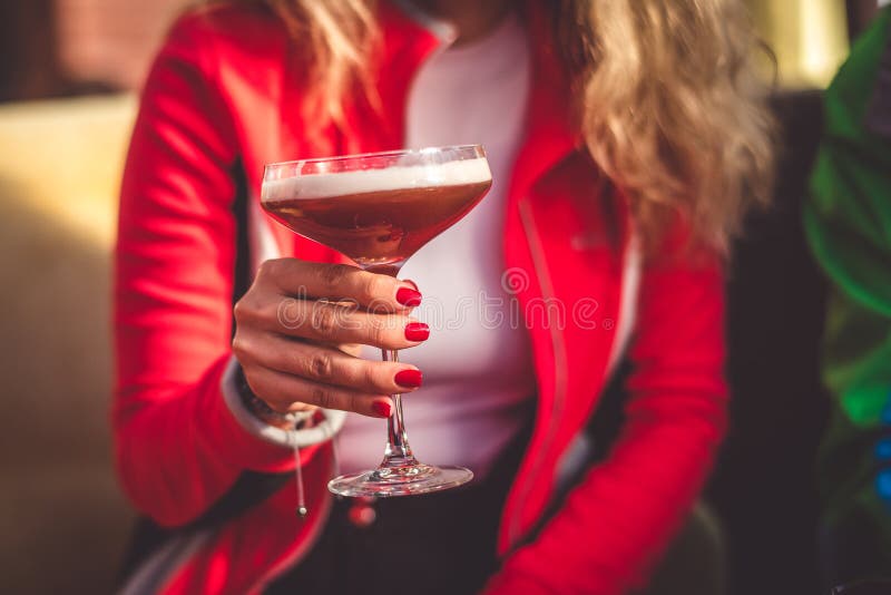 Cocktail in hand stock image. Image of disco, cocktails - 88828595