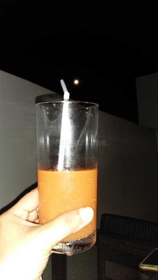 Moonlight Cocktail with a Slice of Orange and Cherry Isolated Stock ...