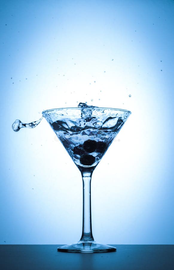 Cocktail Martini Glass Splash On White And Blue Gradient Background ...
