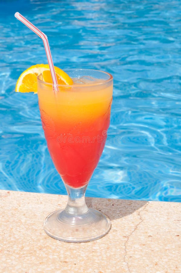 Cocktail by the pool stock image. Image of vacation, sunny - 26088197
