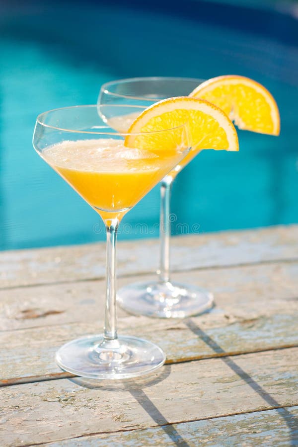 Cocktail on the pool stock image. Image of drink, glass - 79959297