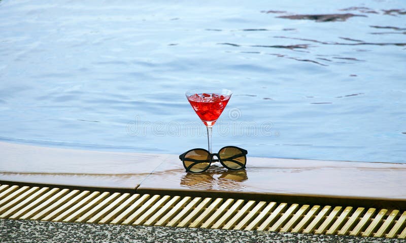 Cocktail by the poolside stock image. Image of beautiful - 92847567