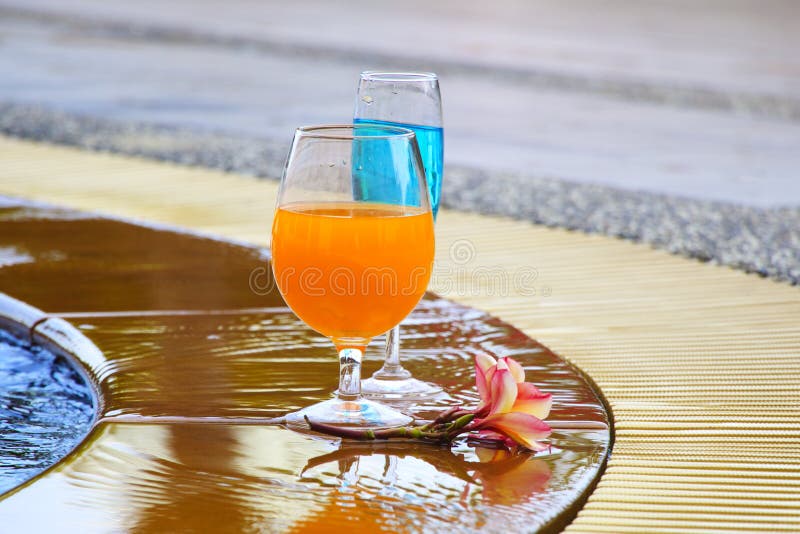 Cocktail by the poolside stock image. Image of relax - 92847625