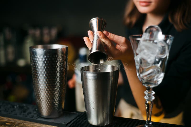 Cocktail Preparation. Bartender Coocks a Beverage at Bar Counter Stock ...