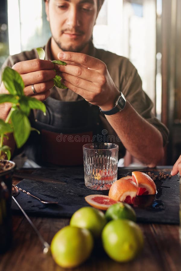 Cocktail Preparation Ingredients on Table with Bartender Stock Image ...