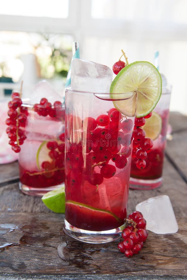 Cocktail with red currants stock photo. Image of juice - 120379340