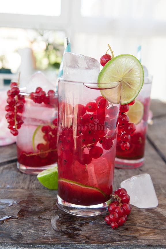 Cocktail with red currants stock photo. Image of juice - 120379340