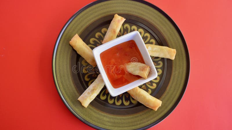 Cocktail Spring Rolls on a Plate with Sweet and Sour Sauce Stock Image ...