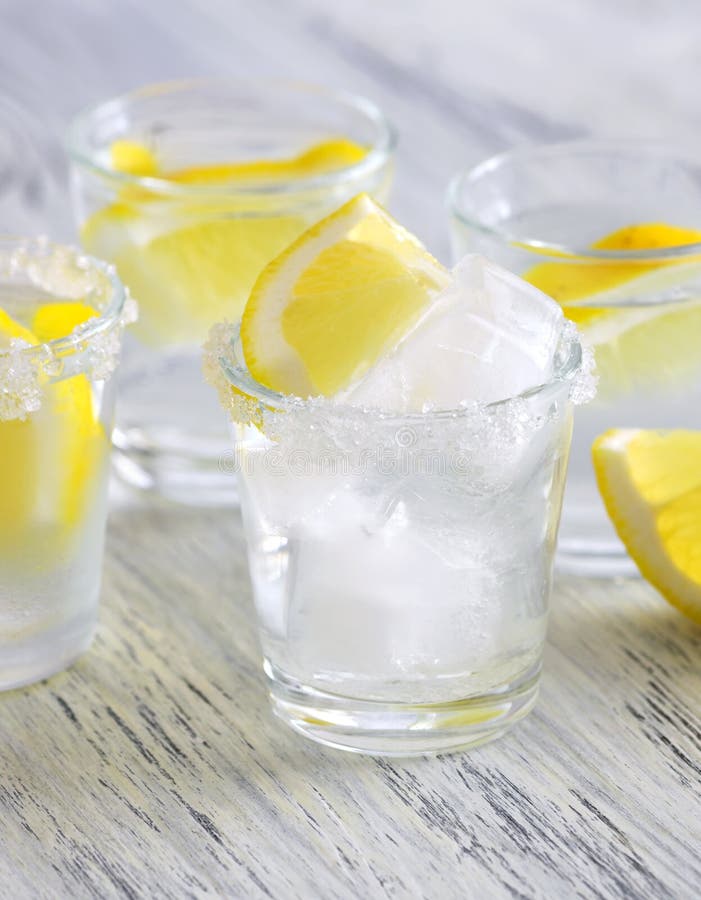 Four Glasses With Vodka With Lemon Stock Photo - Image of year ...
